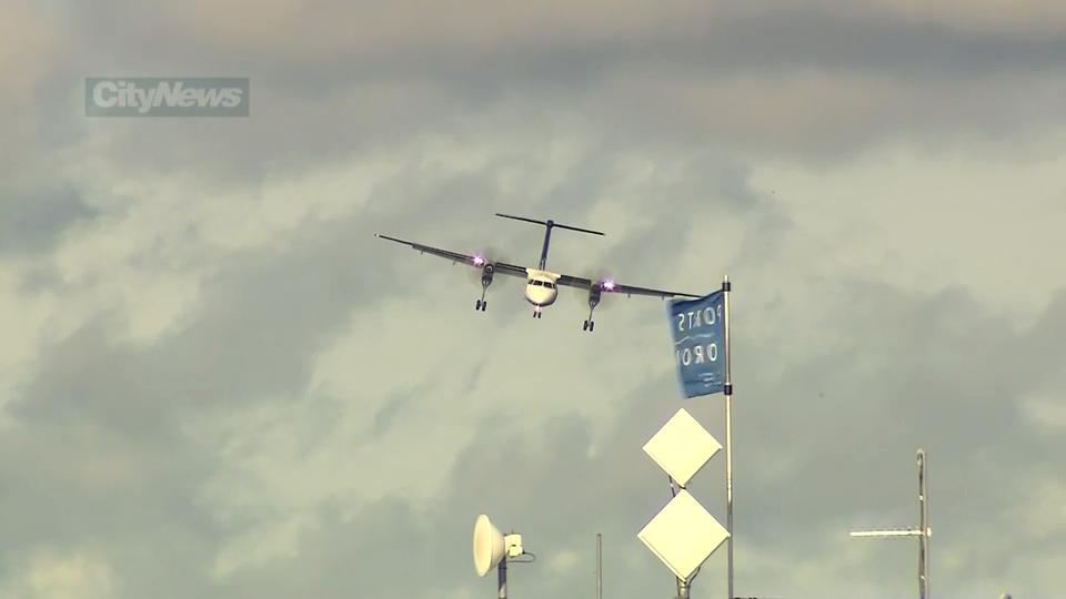 Plane sways in high winds during landing at Toronto island airport
