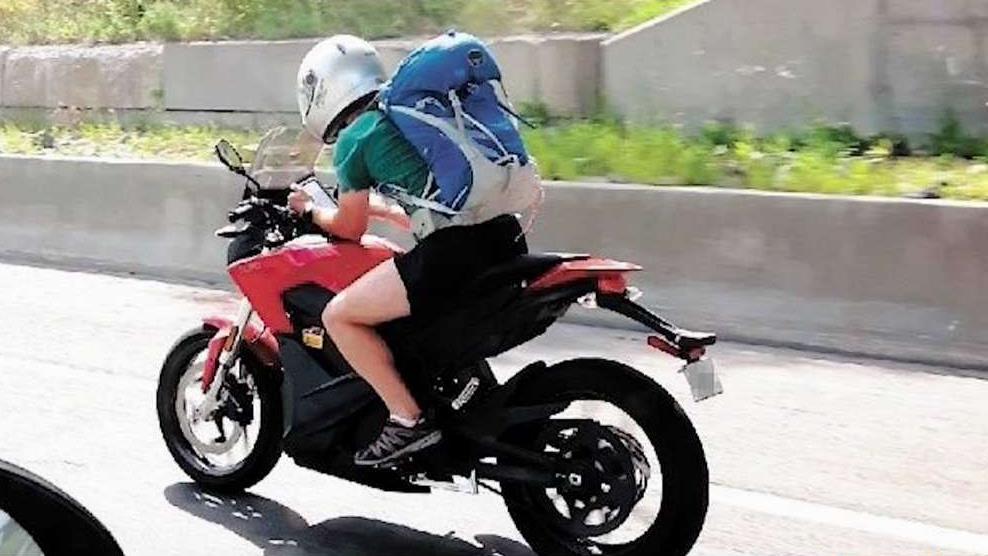 Shocking photo captures motorcyclist texting while driving