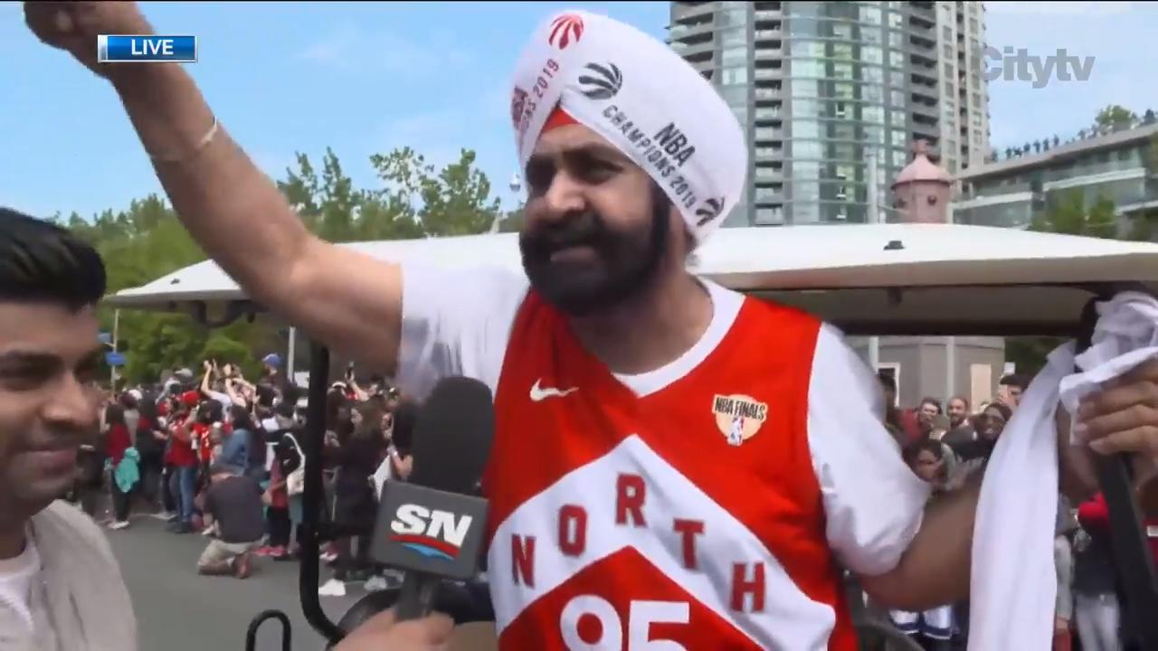 Raptors superfan Nav Bhatia celebrates at championship parade