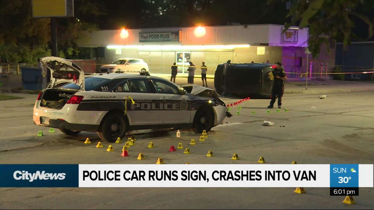 Police car blows through stop sign, hits van