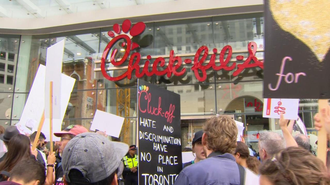 LGBTQ, animal rights groups protest Chick-fil-A opening - Video ...